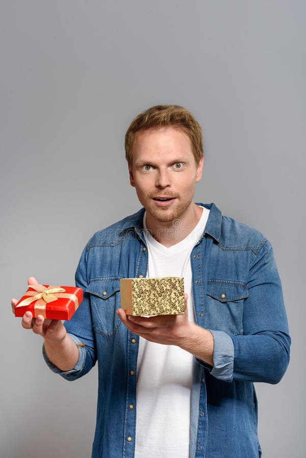 Happily Surprised Guy Holding Gift Box Stock Photos - Free & Royalty ...