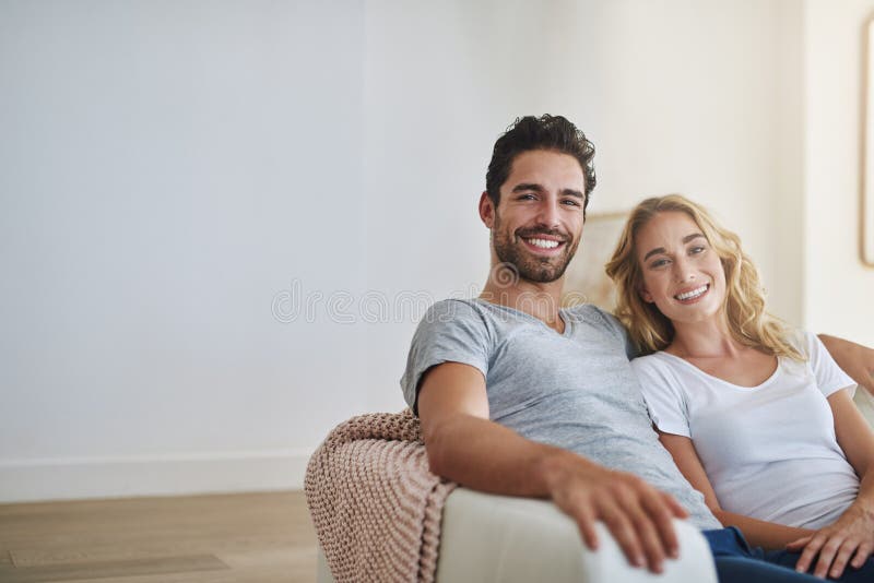 Happiness Makes a House a Home. a Young Couple Relaxing at Home. Stock ...