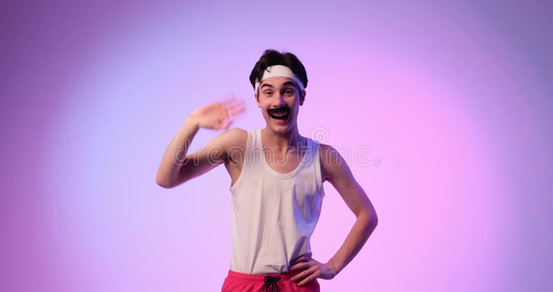 Happy 80s Man Waving Hand on Purple Background Stock Footage - Video of ...