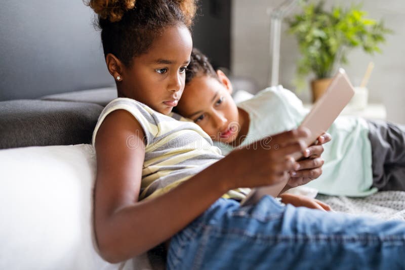 Happy Children Havig Fun and Using Technology Devices Stock Image ...