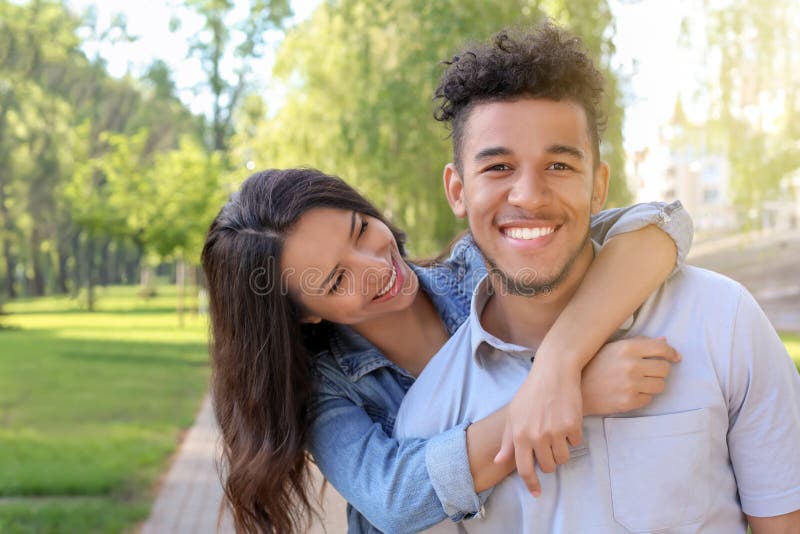 Happy African-American Couple in Park on Spring Day Stock Photo - Image ...