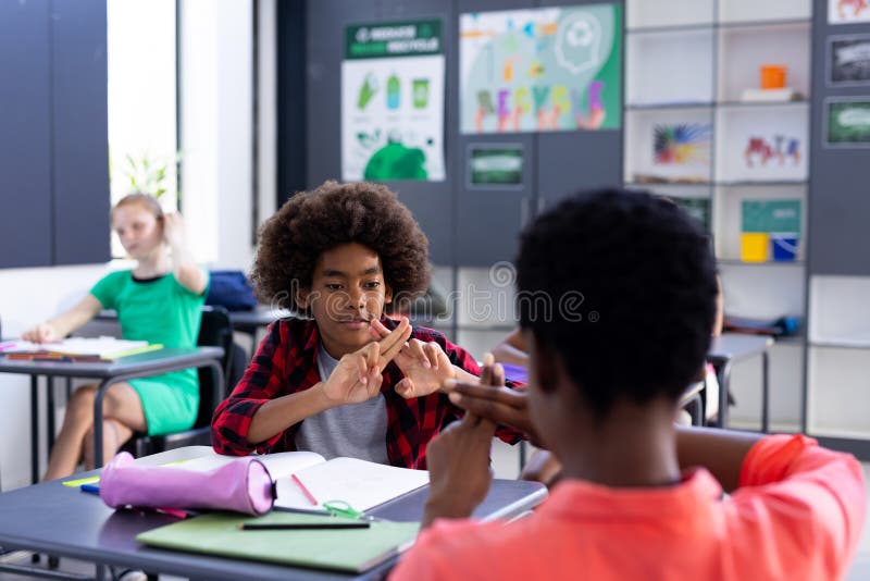 Happy African American Female School Teacher and Boy Practicing Sign ...