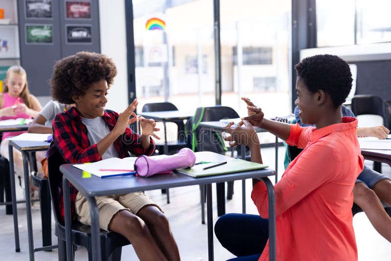 Happy African American Female School Teacher and Boy Practicing Sign ...