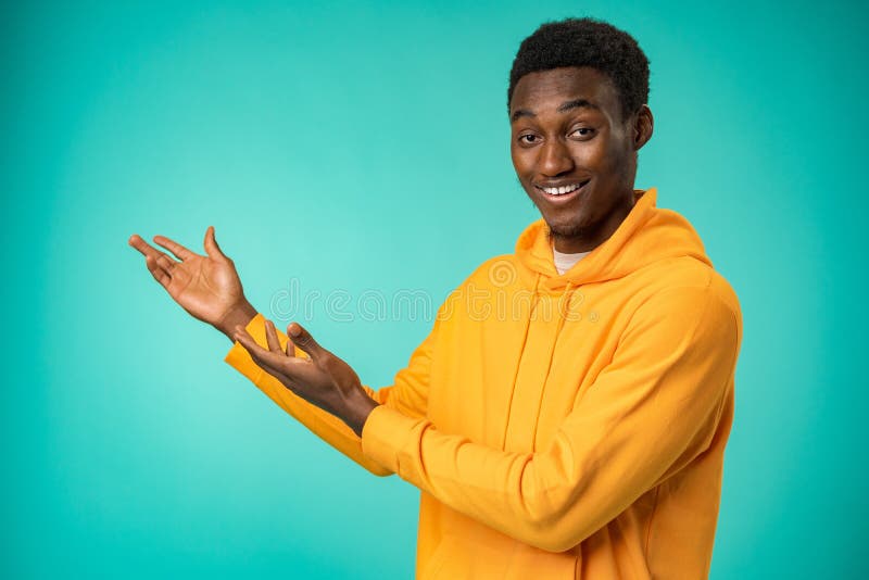 Happy African American Man Pointing Finger at Copy Space Stock Photo ...