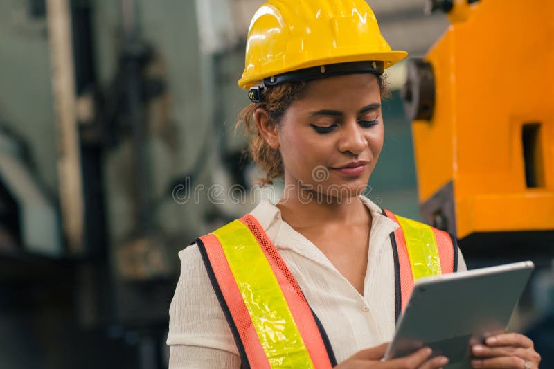 Happy African American Woman Engineer Worker Supervisor Looking at ... Happy African American Woman Engineer Worker Supervisor Looking at ...