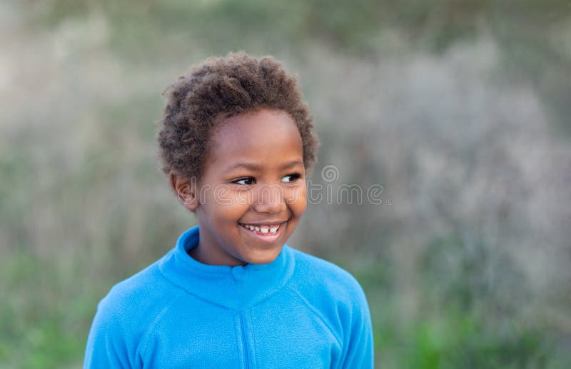 Happy African Child with Blue Jersey Stock Photo - Image of elementary ...