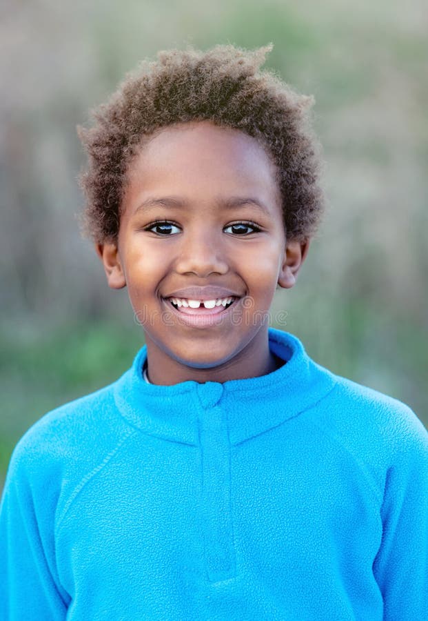 Happy African Child with Blue Jersey Stock Image - Image of integration ...