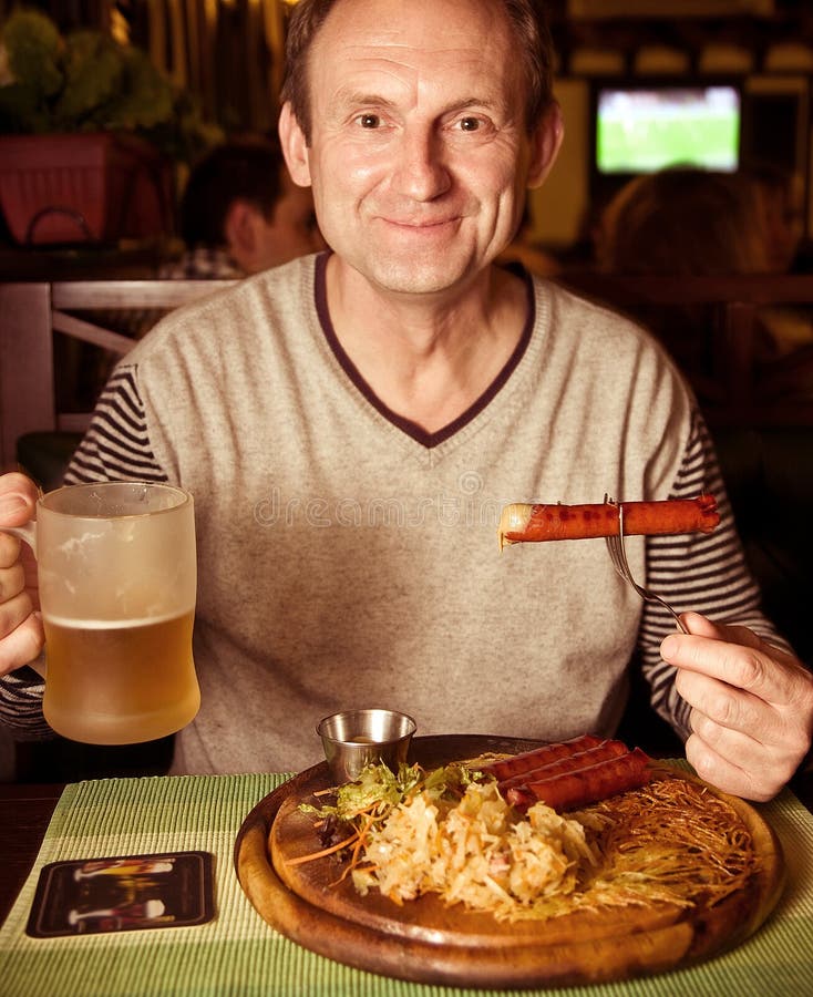 Happy aged man eating stock image. Image of meat, happy - 27153421