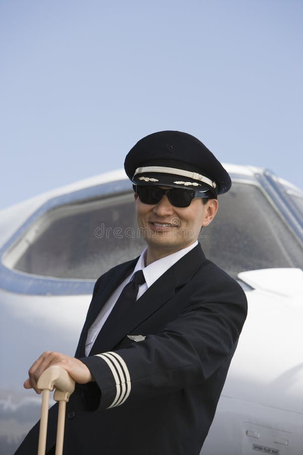 Captain Standing by Aircraft at Airfield Stock Photo - Image of ...