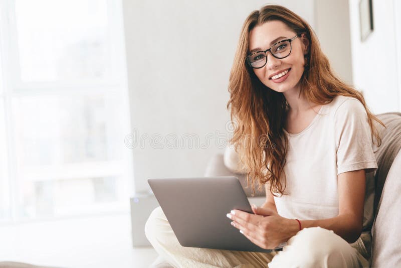 Lady on computer smiles stock image. Image of workforce - 178707