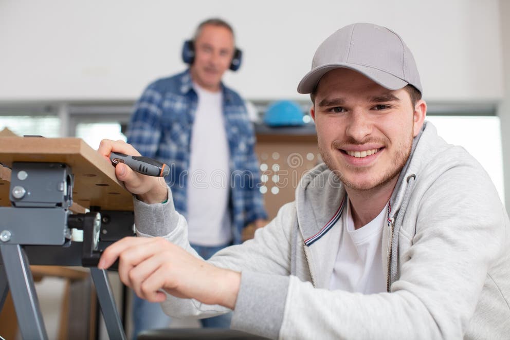 Happy Apprentice Working in Studio Stock Image - Image of wooden, nail ...
