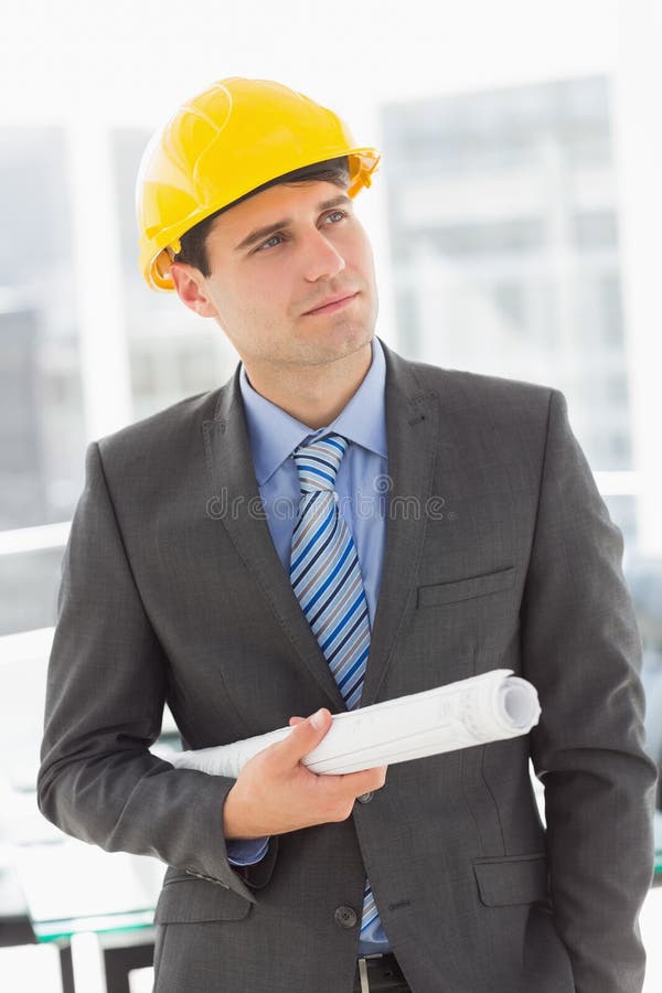 Happy Architect Thinking and Holding Blueprints Stock Image - Image of ...