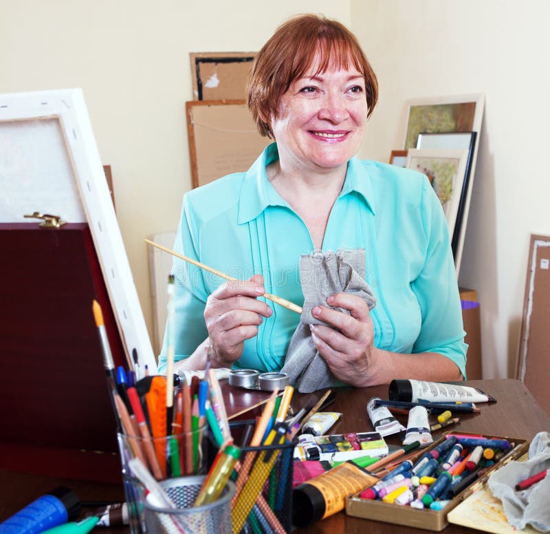 Happy artist draws stock image. Image of canvas, adults - 57011843