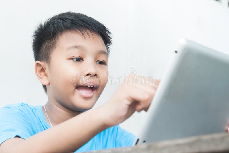 Happy Asian Boy Using Tablet, Child Using Computer and Technology Stock ...
