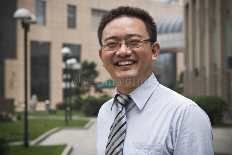 Happy Asian Business Executive Stock Image - Image of collar, depth ...