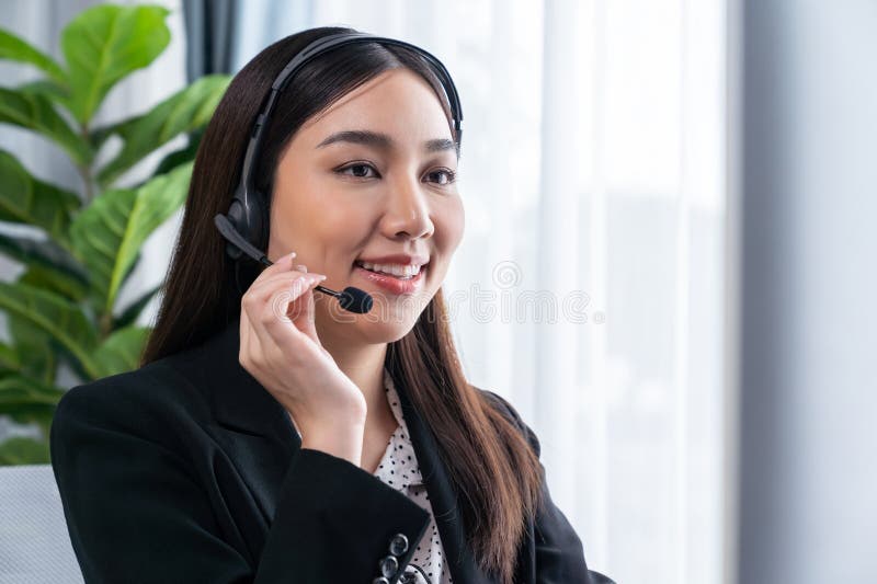 Happy Asian Call Center Operator with Headset. Jubilant Stock Image ...