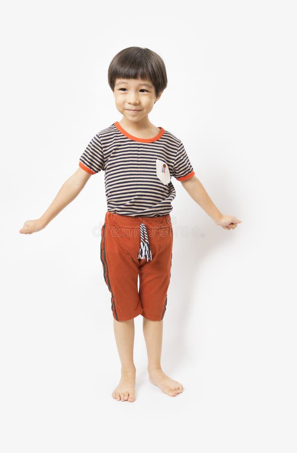 Happy Asian Child Boy Standing on White Background. Stock Photo - Image ...