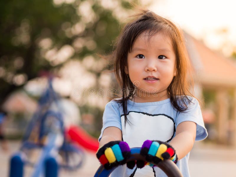 Happy Asian Child on a Seesaw Stock Image - Image of asian, summer ...
