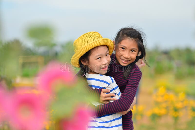 Cute Asian Girl with Pink Flower Field Outdoor Stock Photo - Image of ...
