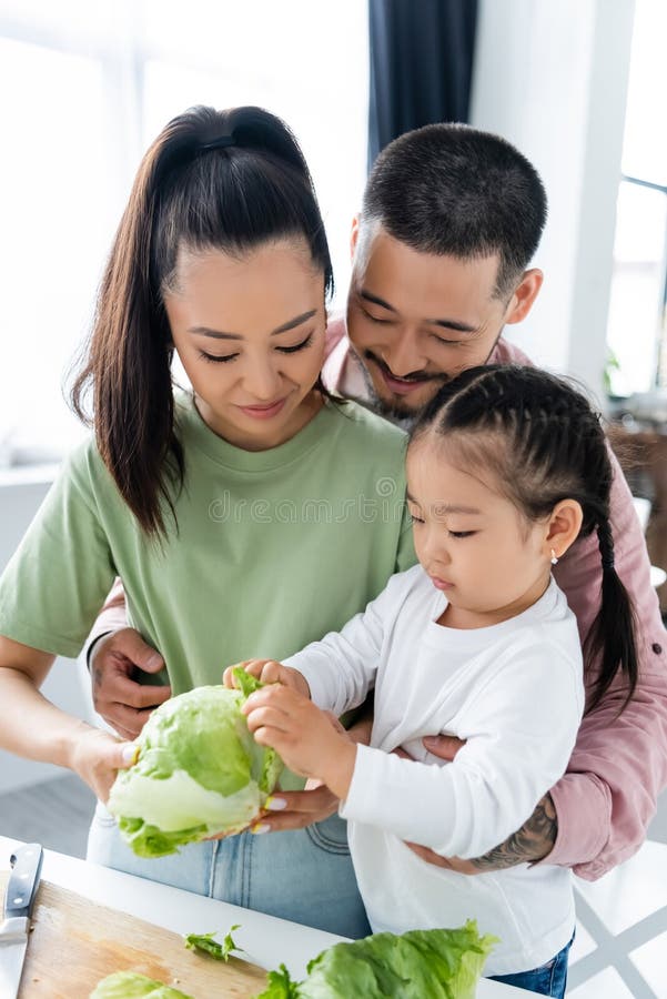 Happy Asian Family Looking at Fresh Stock Image - Image of girl ...