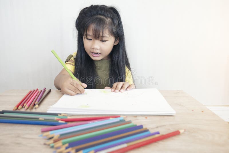 Asian Girl Drawing with Colored Pencils Stock Photo - Image of cheerful ...
