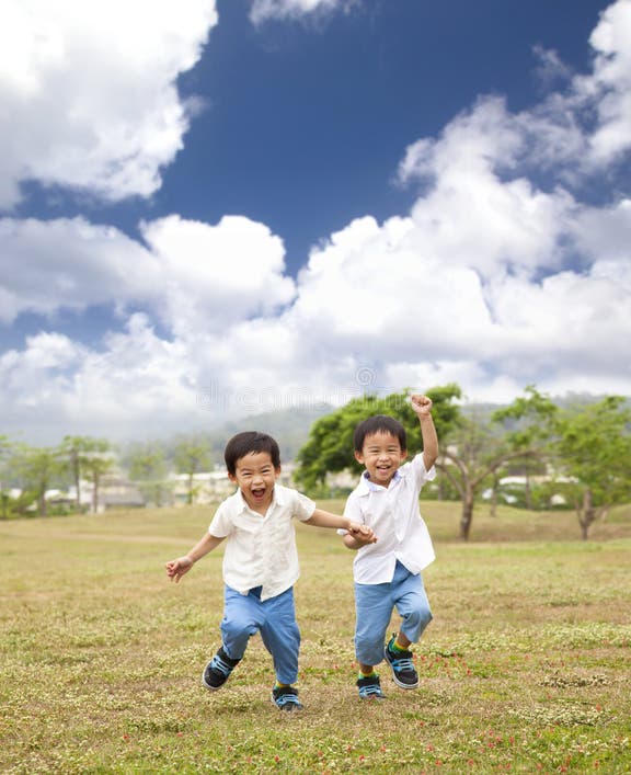 Happy asian kids running stock photo. Image of childhood - 20765492