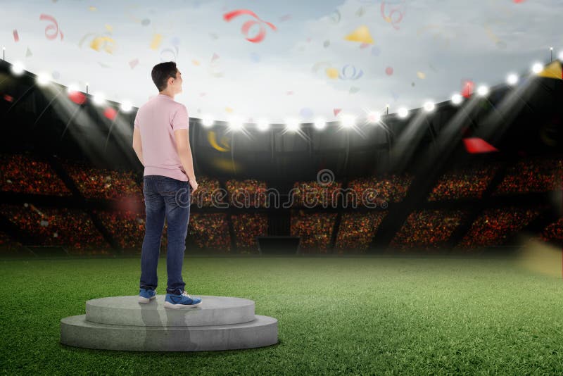 Happy Asian Man Standing on Podium with Confetti Stock Image - Image of ...