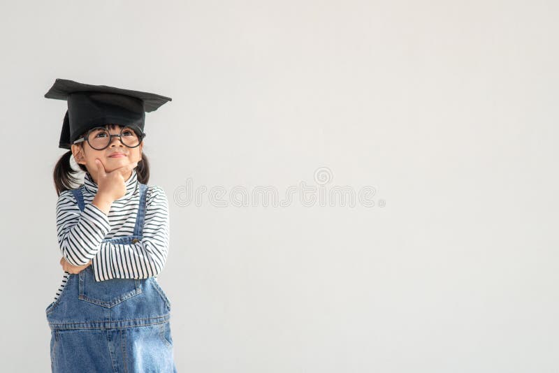 Happy Asian School Kid Graduate Thinking with Graduation Cap Stock ...