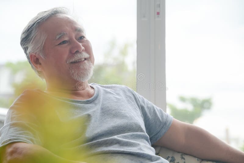 Happy Asian Senior Man Sitting at Home Stock Image - Image of house ...