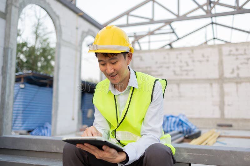 Happy Asian Smiling in Engineering Uniform at Construction Site while ...
