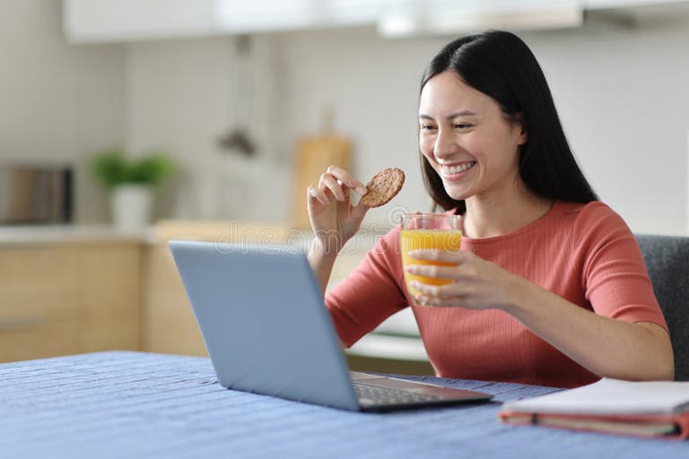 Happy Asian Student E-learning at Breakfast Stock Image - Image of college, cookie: 349093783
