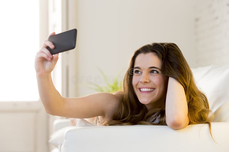 Happy Attractive Girl Playing Home Couch Taking Selfie Portrait Mobile