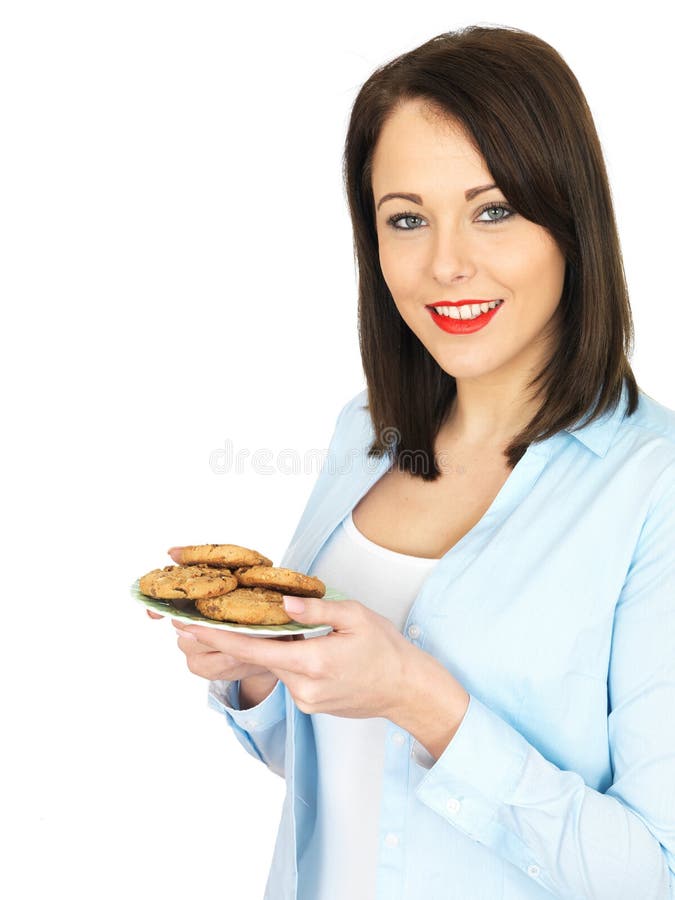 Happy Attractive Young Woman Eating Biscuits Stock Photo - Image of ...
