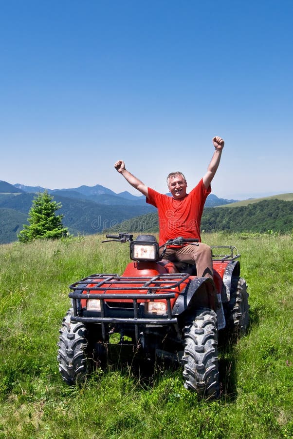 Happy ATV driver - quad stock photo. Image of hobby, four - 6587844