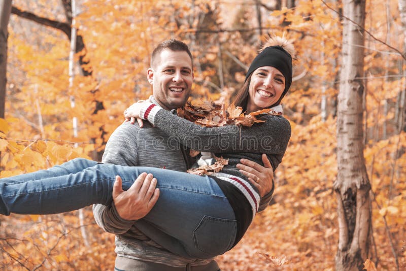 Happy Autumn Fall Couple in a Park Stock Photo - Image of outdoor ...