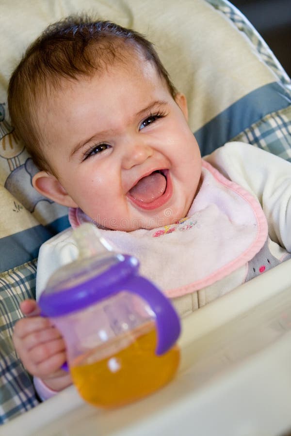 Happy Baby stock image. Image of highchair, laugh, sippy - 4975043