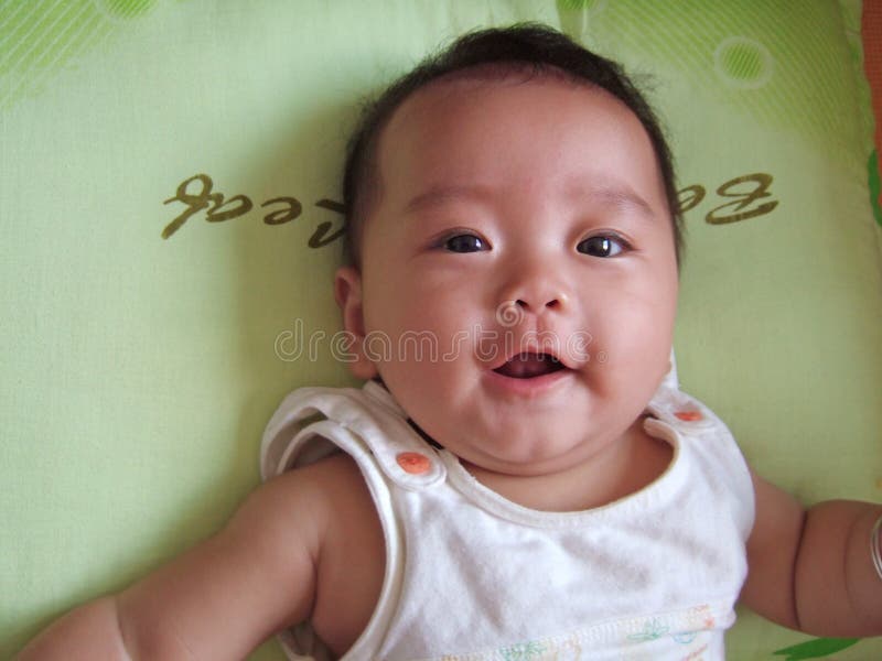 Happy baby stock image. Image of blue, child, chin, cute - 6489595