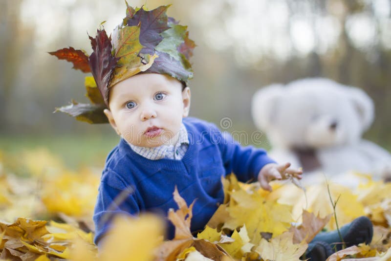 Happy baby in autumn stock photo. Image of childhood - 184483390