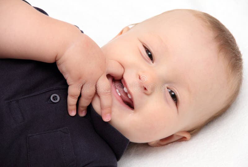 Happy baby on back stock photo. Image of innocence, finger - 34251050