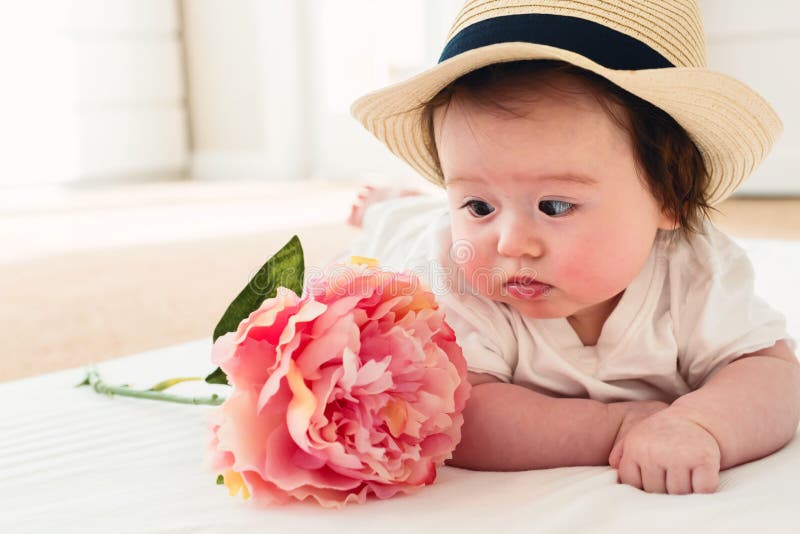 Happy Baby Boy with Pink Flower Stock Photo - Image of cute, portrait ...