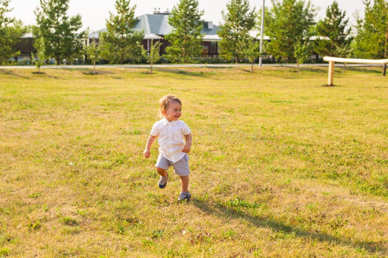 Happy Baby Boy Running on Summer Field Stock Image - Image of move ...