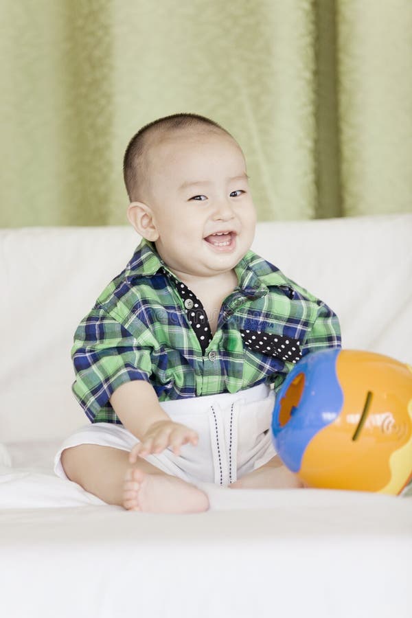 A lovely baby stock image. Image of baby, portrait, grass - 31377059