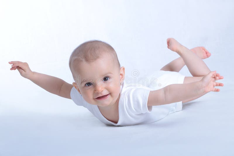 Happy baby flying on white stock photo. Image of flying - 20485036