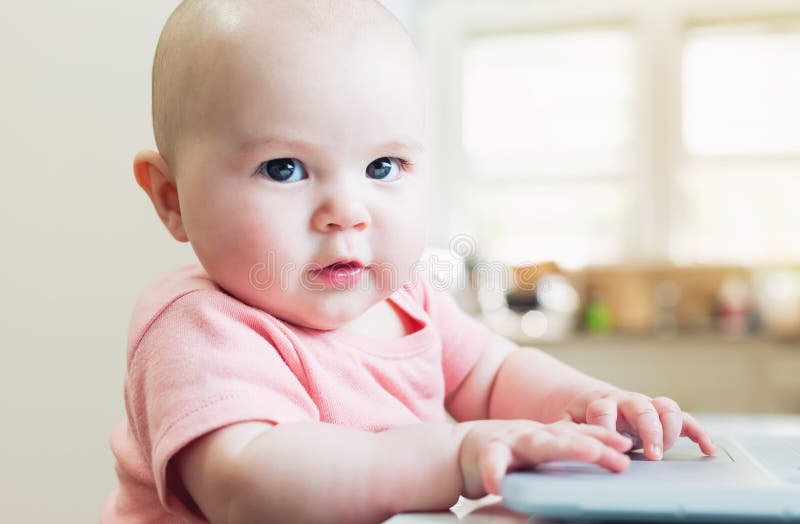 Happy Baby Girl Using Laptop Computer Stock Photo - Image of girl ...