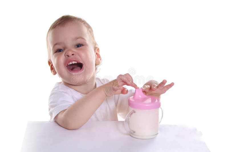 Happy baby with milk stock photo. Image of nutrient, holding - 995216