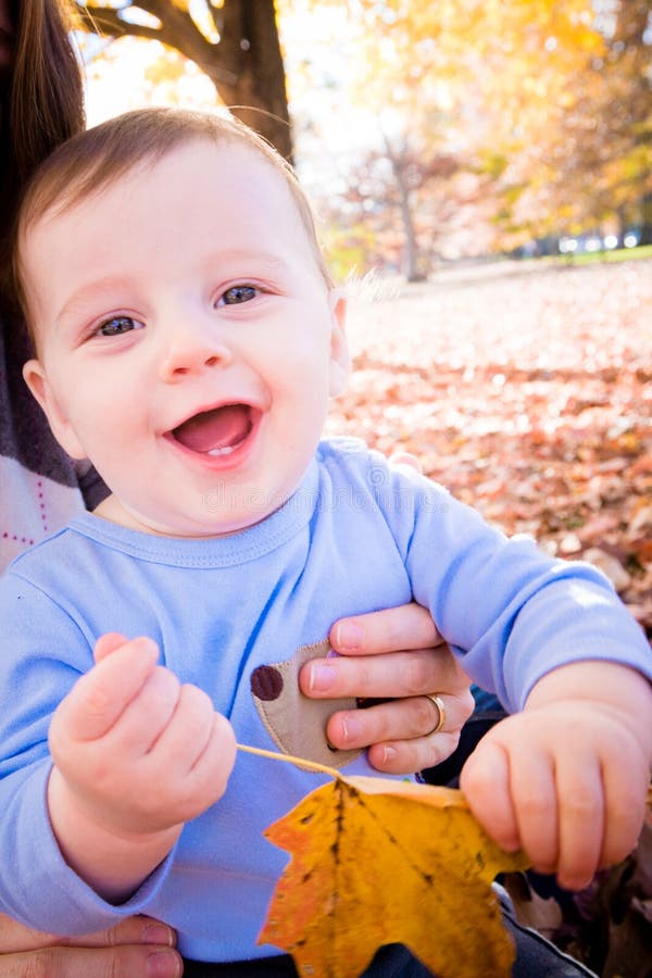 Happy Baby Boy with Thick Hair Stock Image - Image of blue, care: 30568451