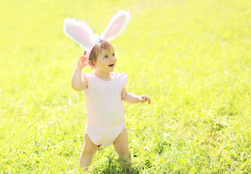 Happy Baby with Rabbit Ears in Sunny Summer Stock Image - Image of ...