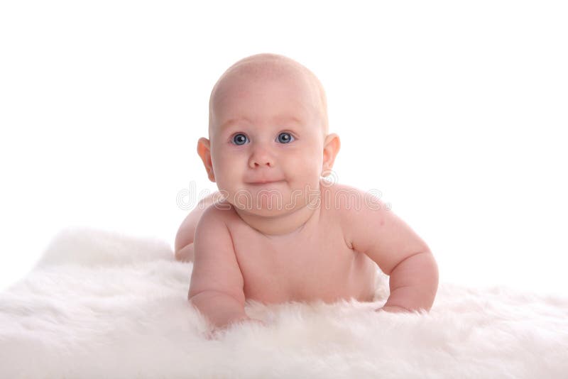 Happy baby on a soft rug stock photo. Image of months - 7432128