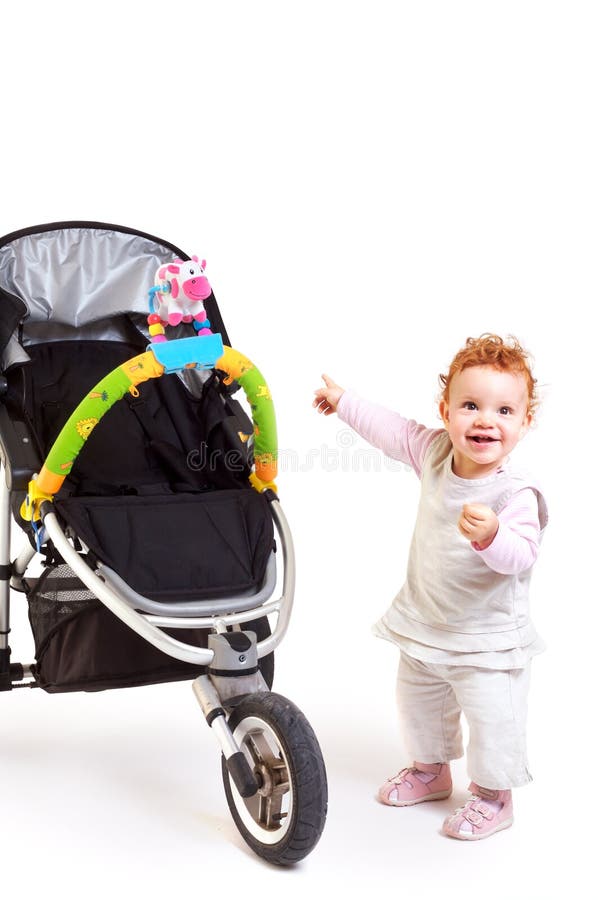Happy baby in stroller stock image. Image of caucasian - 20691197