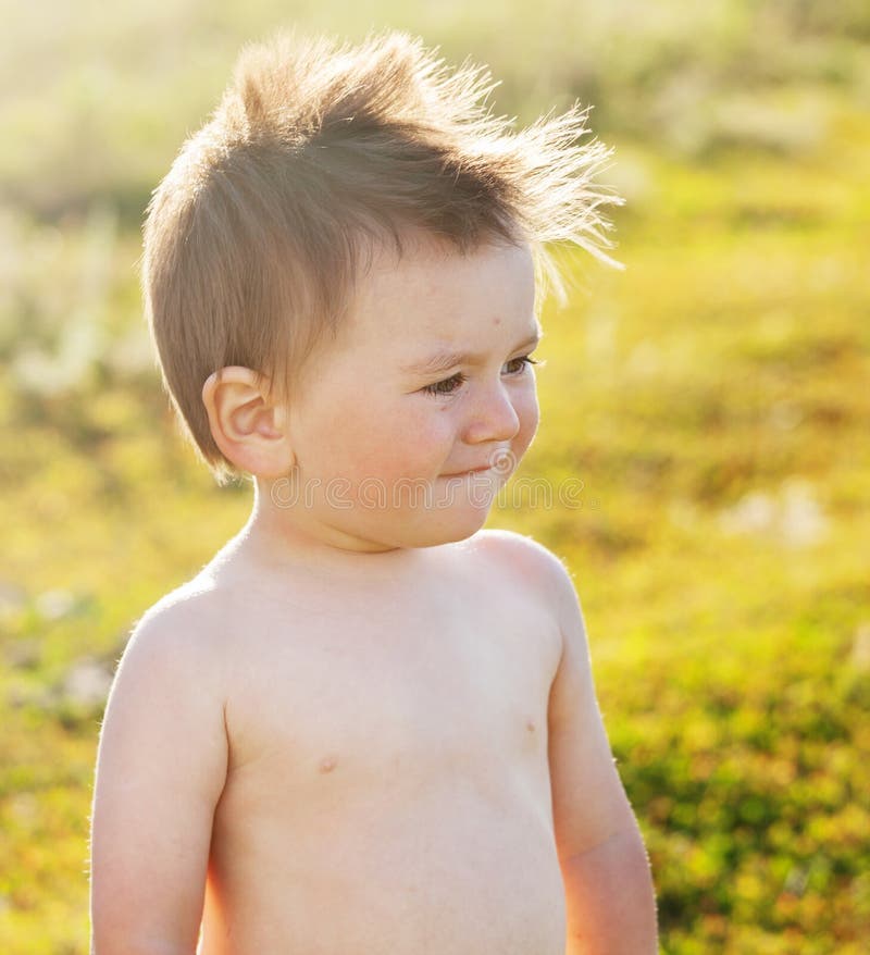Happy baby at sunset stock image. Image of months, boys - 74467407